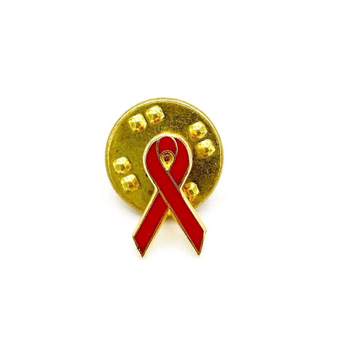 red ribbon pin – Nakamura Keith Haring Collection